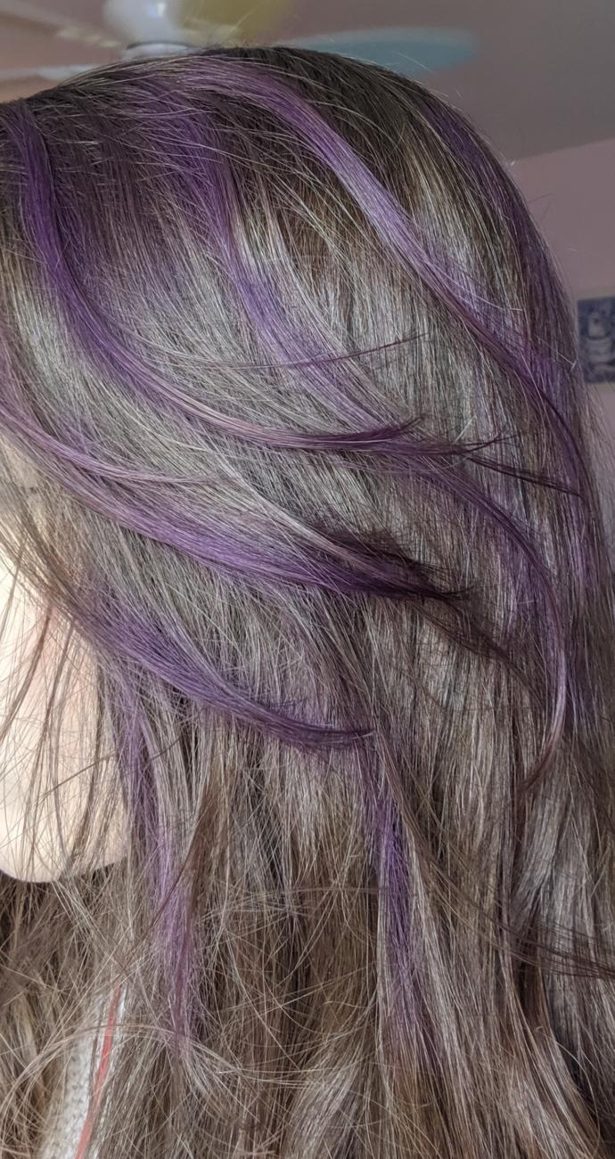 I just impulsively put a bunch of purple streaks through my hair. How's ...