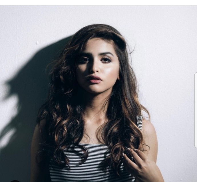 What do you think she looks more attractive (long hair or short hair ...