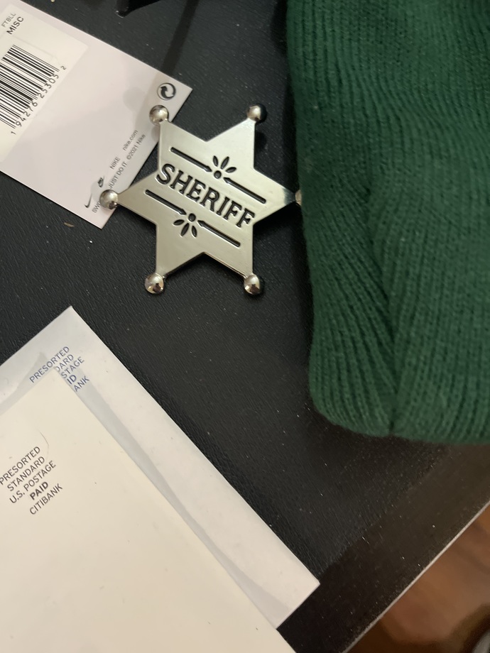 Why does my stepdad have a sheriff badge on his desk even though he was ...