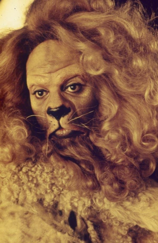 Who played the Cowardly Lion by their performance in their respective movies, Bert Lahr or Ted ...