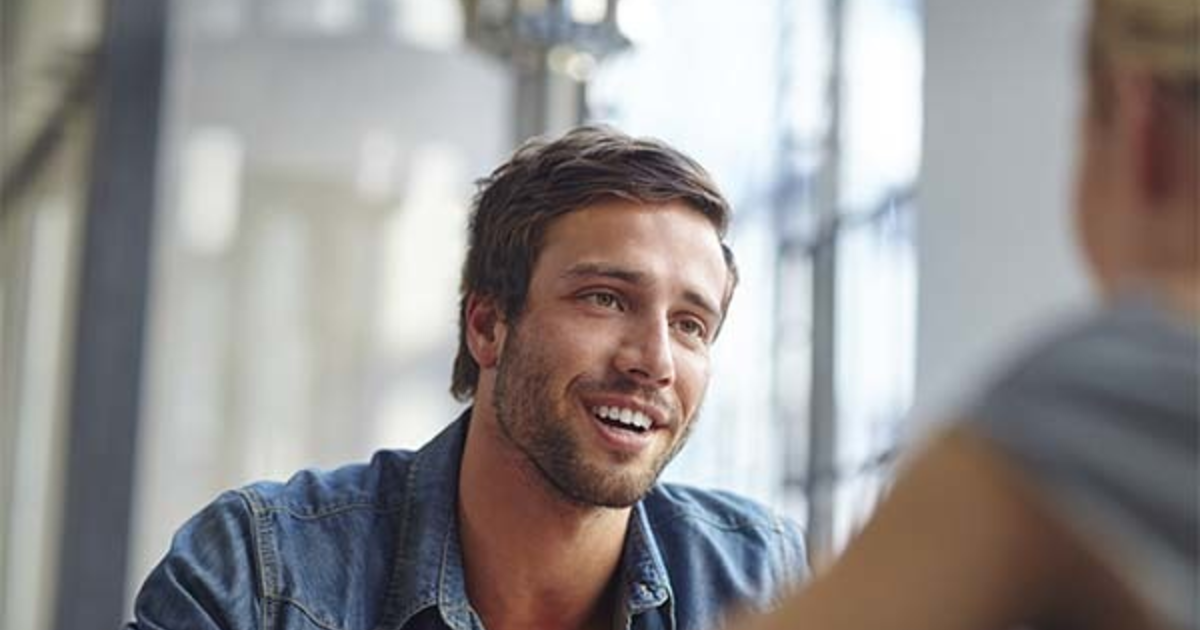 How can I use body language to show interest to a crush? - GirlsAskGuys