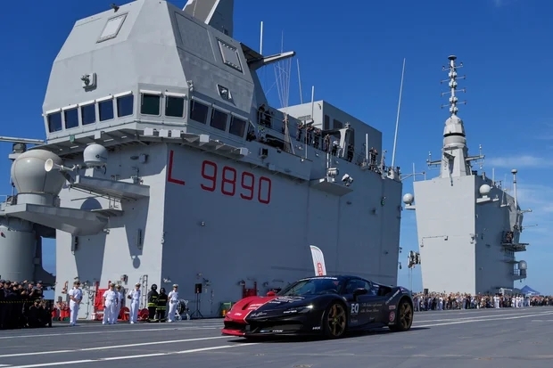 What do you think about a guy going 100+ MPH in a car on an aircraft ...