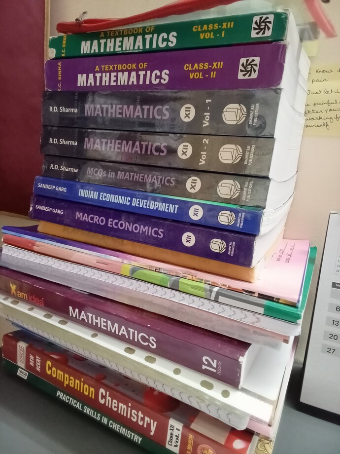 How many math books in the stack? - GirlsAskGuys